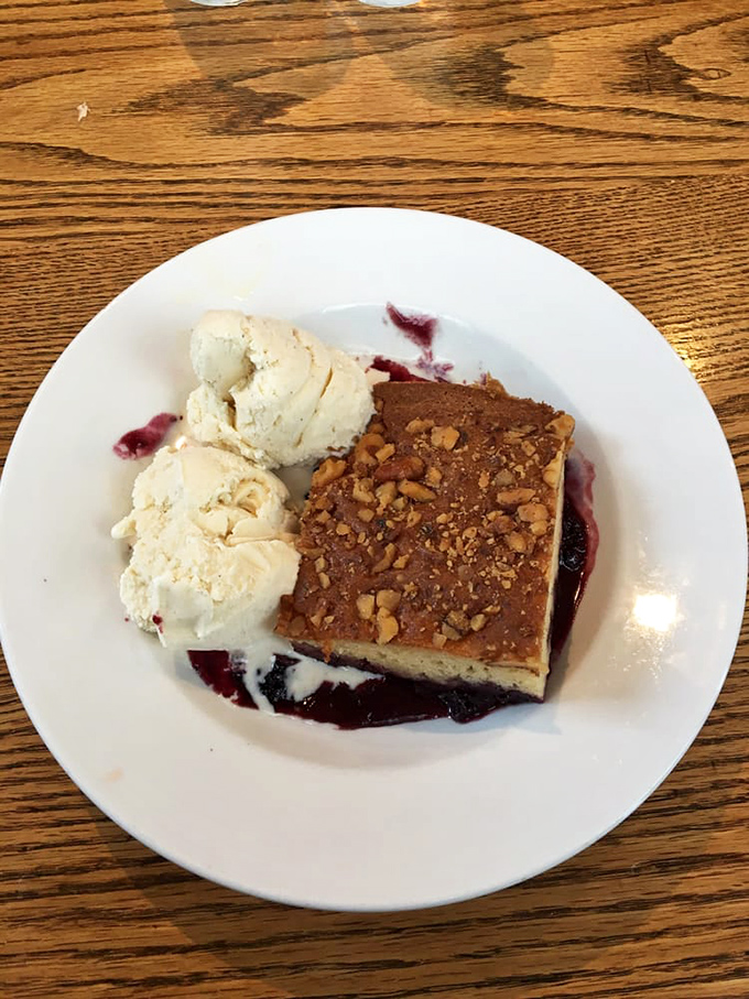 Dessert that makes you consider skipping straight to the end of the meal. Warm cobbler with ice cream &ndash; the ultimate comfort food finale.