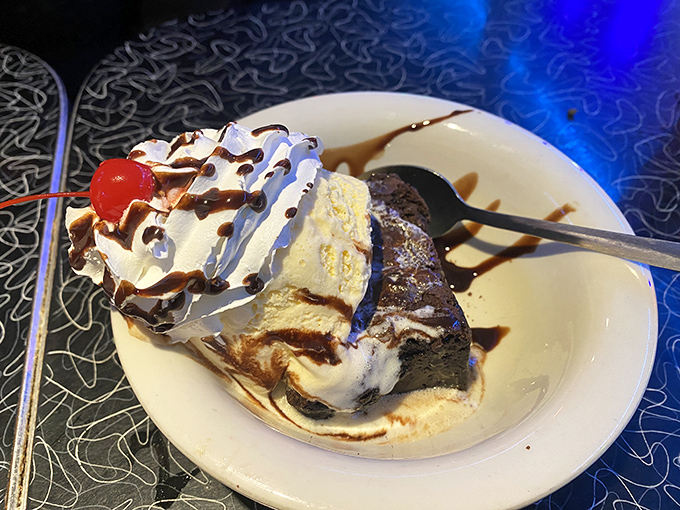 A brownie à la mode that's having an identity crisis—is it breakfast? Dessert? Who cares when warm chocolate meets cold ice cream in perfect harmony.