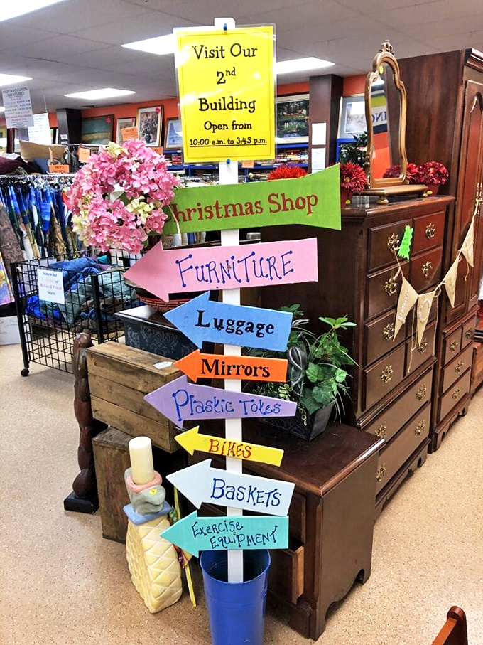 This colorful directional sign is the thrift store equivalent of "You are here"—except "here" could be anywhere from Christmas to Exercise Equipment.