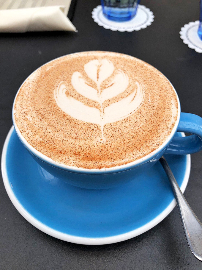 Coffee art so beautiful you'll hesitate to drink it, then immediately order another after tasting.