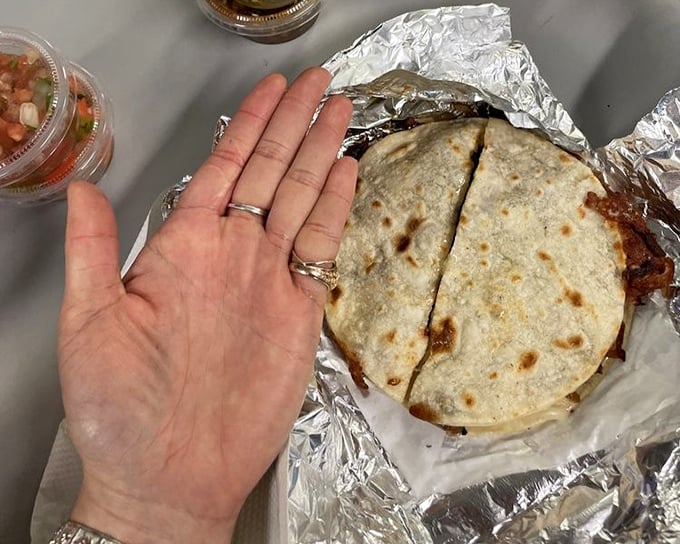 Hand-sized quesadilla proves that sometimes the simplest pleasures create the most lasting food memories here. 