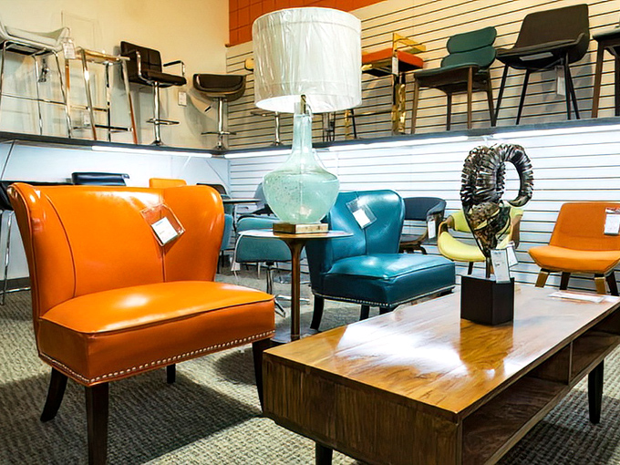 Mid-century chair heaven in shades that scream "Palm Springs." That orange leather number would make the perfect reading nook for your desert escape.