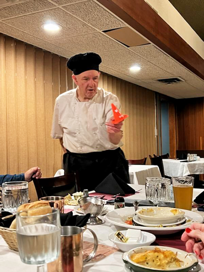 The chef in his element, sharing wisdom earned through thousands of perfectly executed meals&mdash;this is culinary heritage in action.