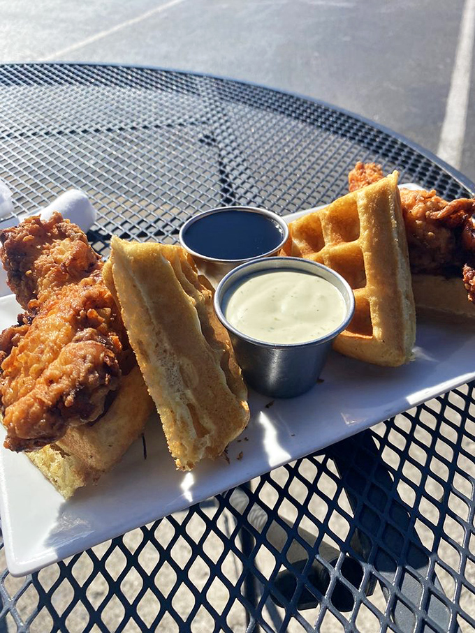 Chicken and waffles: the breakfast-lunch power couple that proves opposites really do attract. Those dipping sauces are standing by for your dunking pleasure.