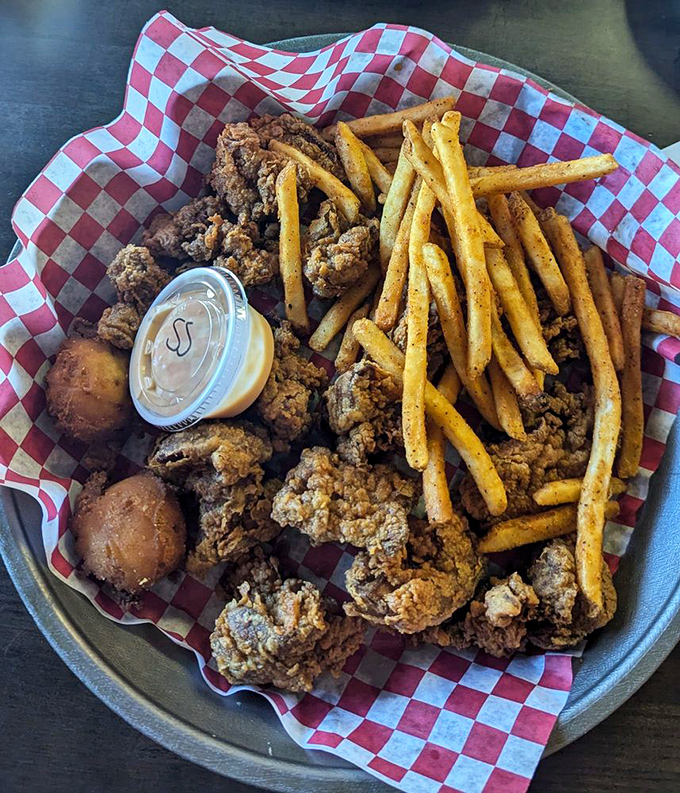Fried chicken and French fries served in a basket—proof that sometimes the best dining experiences come without fancy plates.