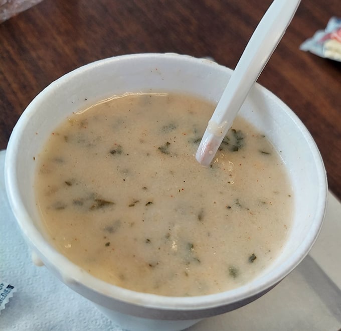 A proper New England clam chowder should be rich enough to coat the spoon but not thick enough to stand it upright. Mission accomplished.