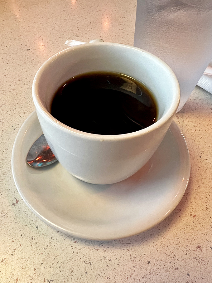 A simple cup of diner coffee&mdash;the unsung hero of American cuisine. Dark, honest, and ready to fuel your day without any fancy foam art.
