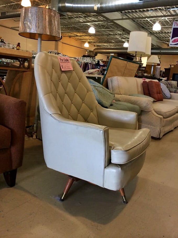That cream leather chair isn't just furniture&mdash;it's a throne from the 1960s waiting for someone to appreciate its retro magnificence.