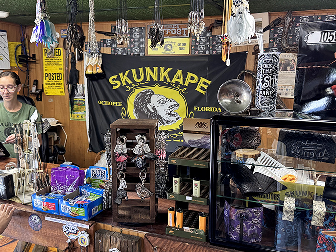 Cryptid commerce at its finest! The gift shop counter offers everything from Skunk Ape merchandise to educational materials about Florida's unique ecosystem.