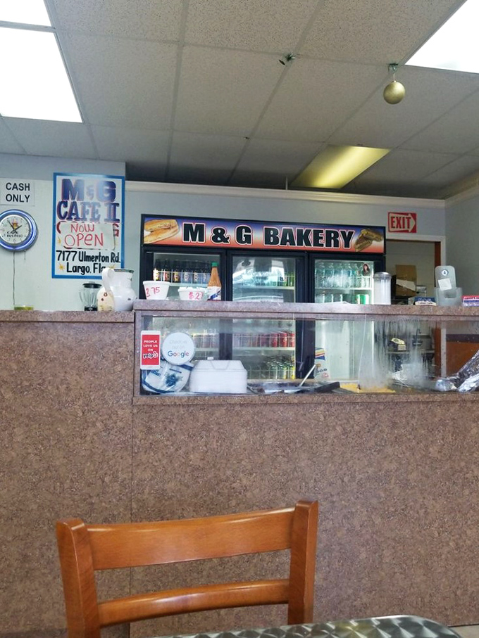 At the counter, coffee magic happens daily - where ordinary beans transform into extraordinary Cuban elixirs.