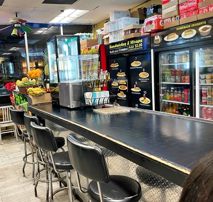 The counter seating offers front-row tickets to the culinary show, where locals perch on chrome stools that have supported decades of satisfied customers.