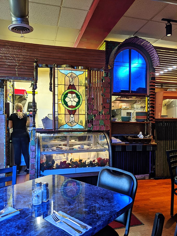 Stained glass meets seafood in this architectural surprise. The display case tempts with ocean treasures while artisanal details delight the eye.
