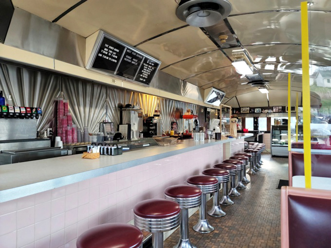 The counter where strangers become neighbors and regulars become family, one cup of coffee at a time.