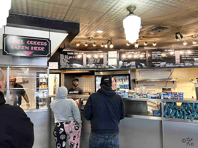 The ordering counter &ndash; where dreams and hunger meet. The staff stands ready to transform your cravings into reality.