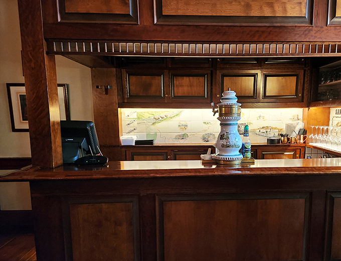 The reception counter balances historical charm with modern necessity. That blue ceramic lamp has probably witnessed more romantic proposals than a jewelry store on Valentine's Day.