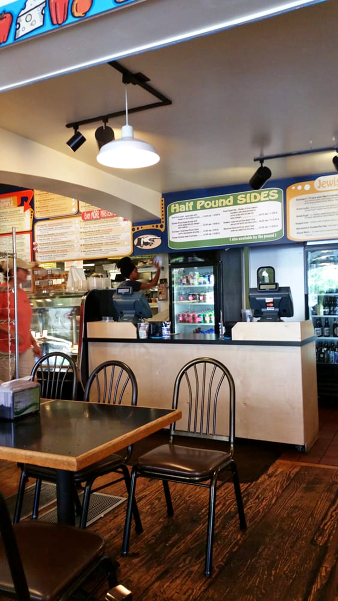 Behind this counter, sandwich artists work their magic with the precision of culinary brain surgeons.