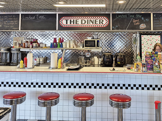 Behind this counter, breakfast dreams come true. The red stools are like front-row seats to a delicious performance.