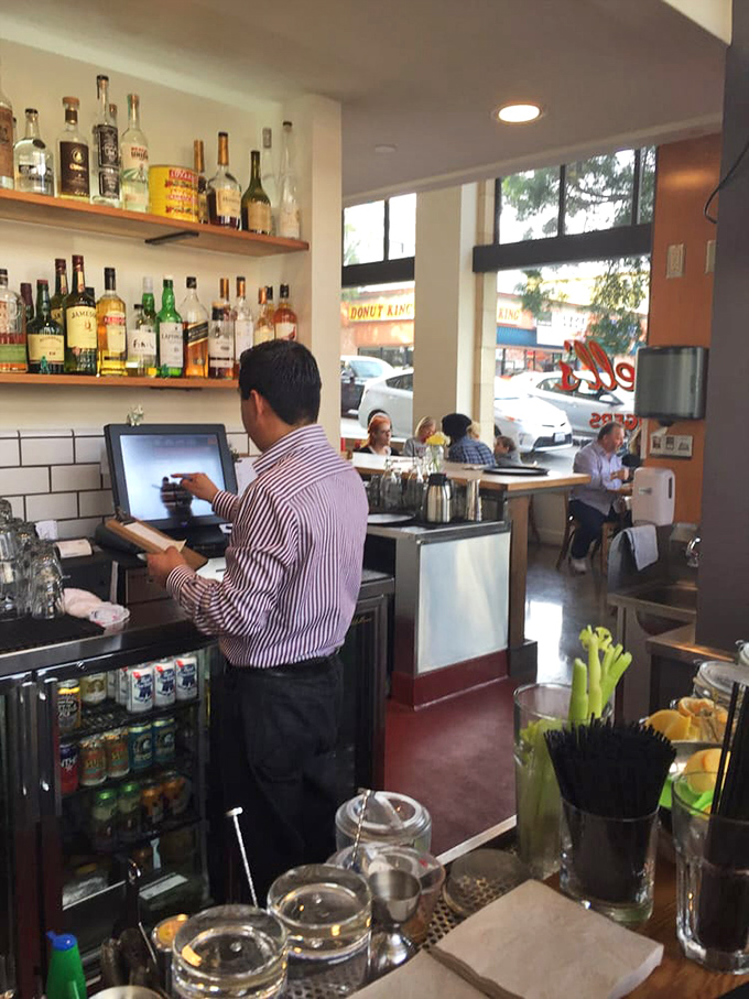 That magical moment between ordering and eating, where anticipation builds and you watch bartenders perform their liquid choreography.