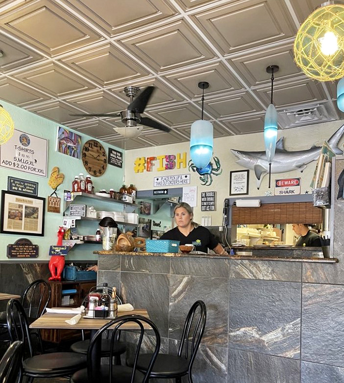 The heart of the operation&mdash;where seafood dreams come true and the staff works their culinary magic with the precision of orchestra conductors.