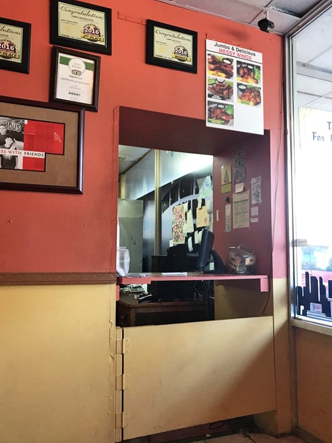 Where the magic happens: the pass-through window offers a tantalizing glimpse into the kitchen laboratory where burger dreams come true.