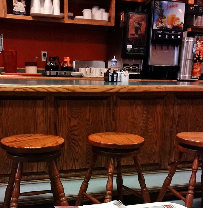 Counter seating that invites lingering conversations over exceptional comfort food and strong coffee.