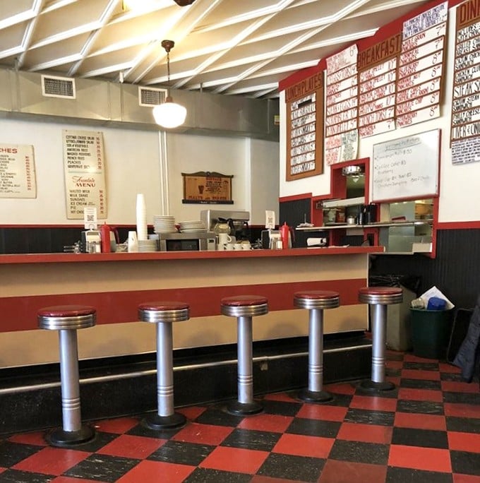 The counter seats: where solo diners become part of the Mickey's family and the short-order ballet unfolds before your eyes.