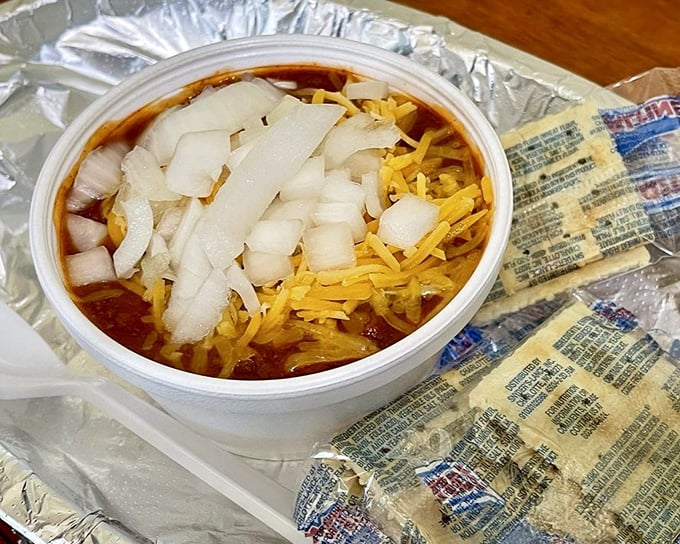 A bowl of chili that could convert vegetarians. Topped with cheese and onions, it's a meal in itself or the perfect burger companion.