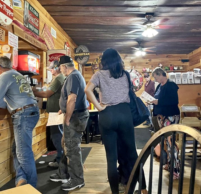 The line forms to the right for smoky salvation. These pilgrims have traveled the barbecue trail and found their mecca.
