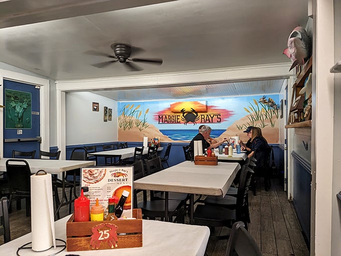 Where locals and tourists find common ground over seafood. The mural says it all—you're here for the crabs.