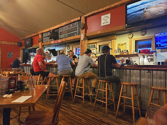 The bar area: where strangers become friends and friends become regulars. Notice how nobody's looking at their phones&mdash;the food commands full attention.