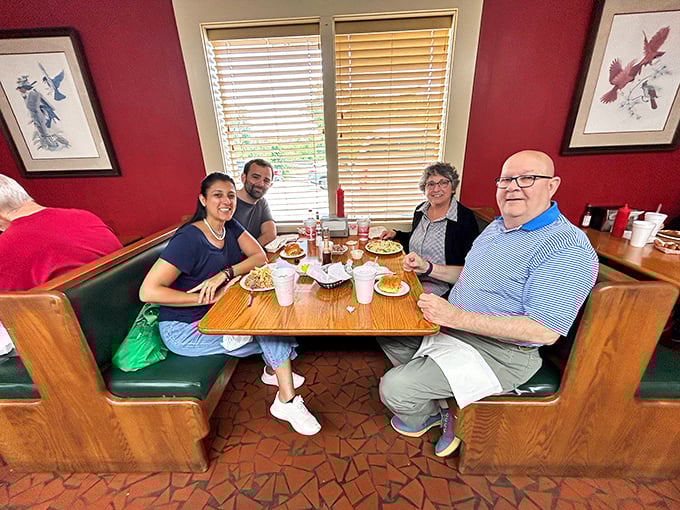 Multi-generational families gathered around tables of barbecue&mdash;this isn't just lunch, it's a North Carolina tradition being passed down in real time.