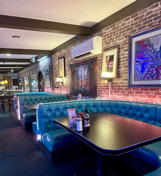 Blue booths that pop against brick walls create the perfect backdrop for both first dates and fiftieth anniversaries. 