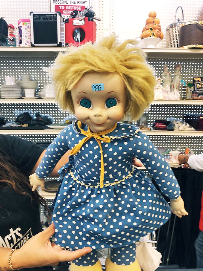 This blue-dressed doll with the unnervingly cheerful expression might follow you home in your dreams whether you buy her or not.