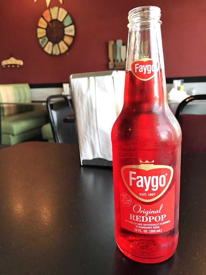 A bottle of Faygo Red Pop &ndash; Michigan's liquid ruby that pairs surprisingly well with both sweet crepes and savory pierogis.