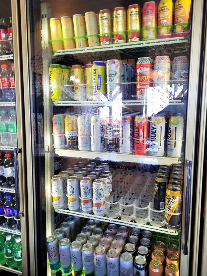 The drink cooler &ndash; where road trip refreshment meets seafood's perfect liquid companions. Choose wisely, my thirsty friends.