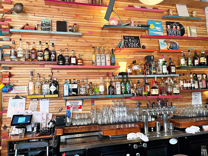 The bar shelves tell a story of liquid possibilities &ndash; from craft beers to cocktail ingredients waiting to complement your d&ouml;ner experience.