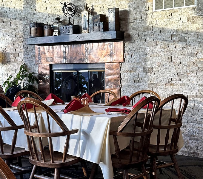 Stone fireplace, copper accents, and tables set with care&mdash;this isn't just dining; it's the Wisconsin version of hygge with better food.