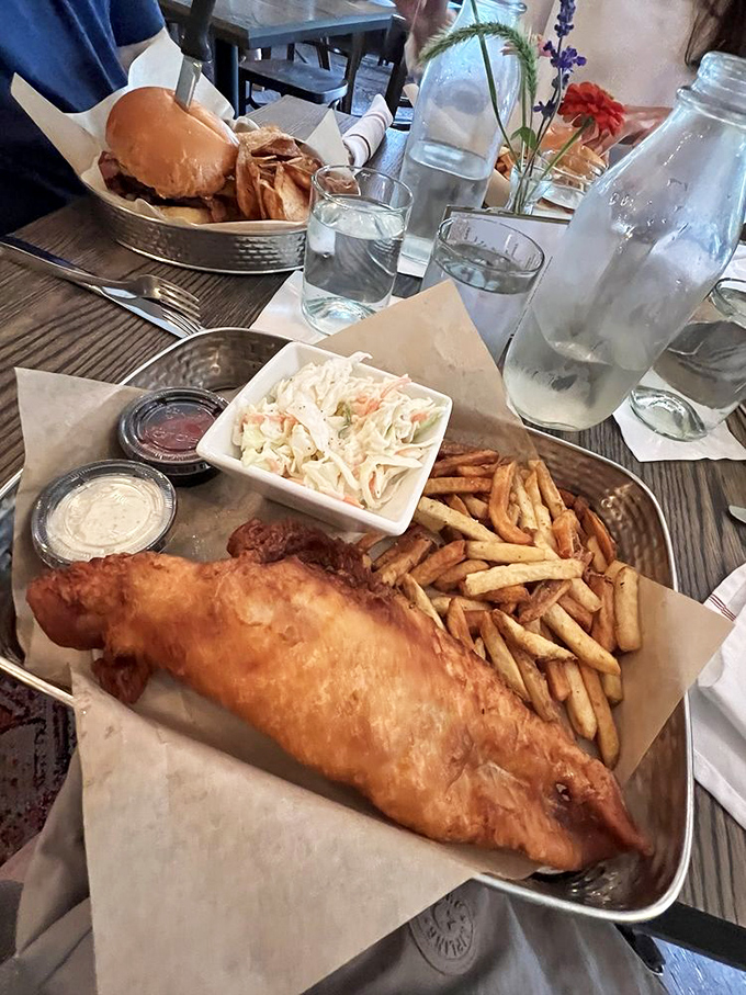 Fish and chips that would make a British pub regular weep with joy. That golden batter deserves its own Instagram account.