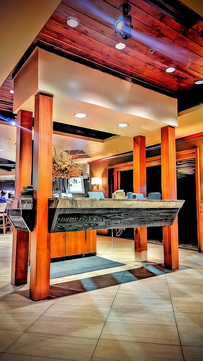 The host stand welcomes you with substantial wooden pillars&mdash;architectural elements that whisper, "The steaks here are just as impressive."