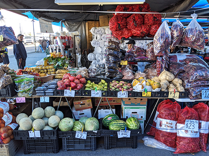Nature's candy displayed with pride. These fresh fruits and vegetables put supermarket produce to shame with their vibrant colors and authentic flavors.