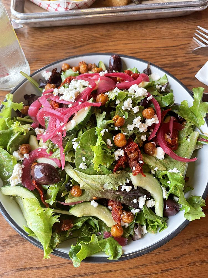 A salad that actually excites&mdash;crisp greens, pickled onions, and roasted chickpeas creating a symphony that makes virtuous eating feel indulgent.