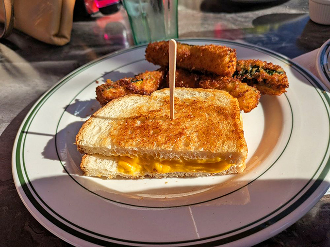 Grilled cheese and zucchini sticks&mdash;proof that comfort food doesn't need to grow up. That golden-brown exterior hides a molten cheese center that's worth every napkin you'll need.