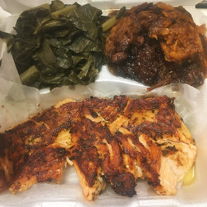 This grilled salmon with its perfect char speaks of a kitchen that understands restraint, while those greens whisper of long, slow cooking.