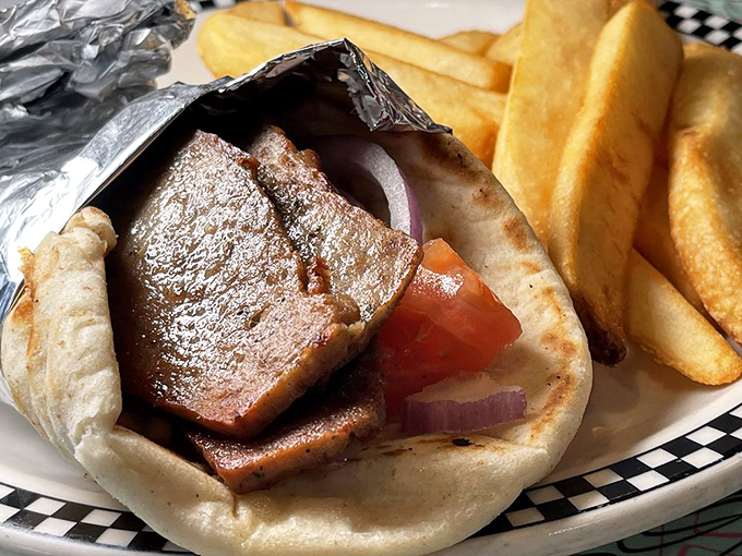 A proper gyro wrapped in foil&mdash;the lunch equivalent of opening a present. Mediterranean flavors with distinctly American portions.