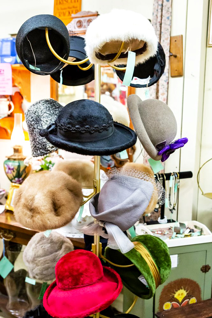 A milliner's dream display of vintage hats spans decades of fashion history. From fur-trimmed elegance to structured felts with sassy ribbons.