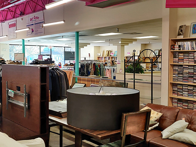 The pharmacy sign reminds shoppers of the store's healthcare mission. Your vintage shirt purchase helps fund HIV services &ndash; retail therapy that actually provides therapy.