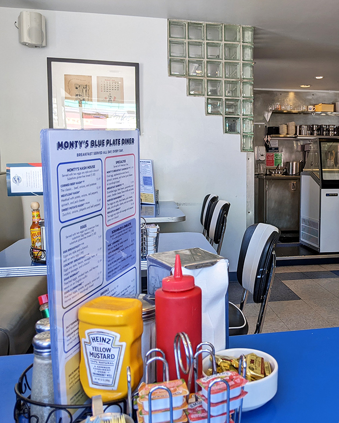 Classic condiments standing at attention, ready for duty. That menu holds secrets worth discovering, one breakfast special at a time.