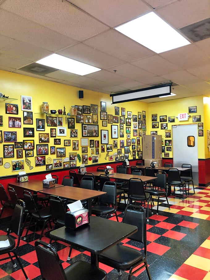 Yellow walls covered in photographs tell stories of countless meals shared. It's social media before social media was a thing.