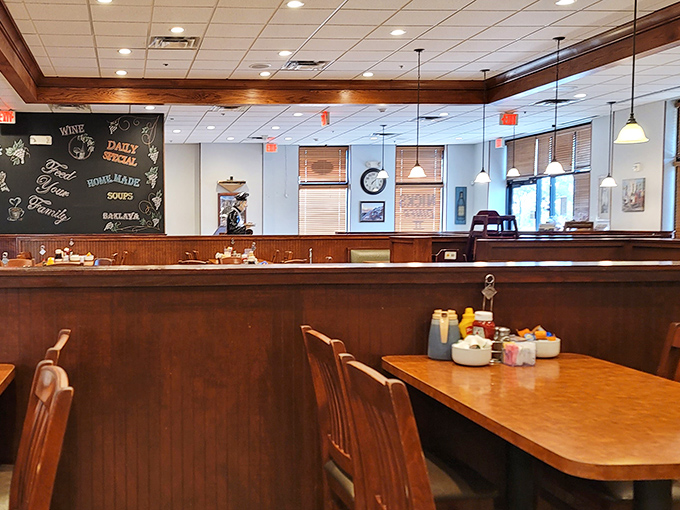 Booths designed for lingering conversations and serious eating. Notice the chalkboard promising homemade soups&mdash;a siren call for comfort food lovers.