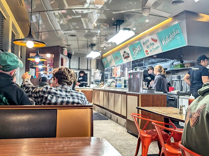 The counter seating isn't just practical&mdash;it's where you get a front-row view of the culinary choreography that makes this place legendary.